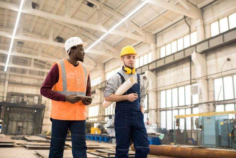 Technicians Discussing Joint Work Stock Image - Image of digital ...