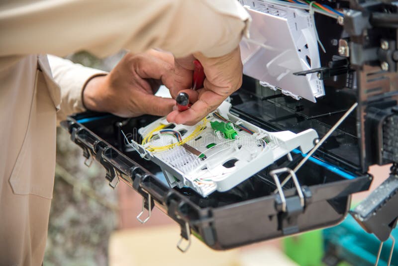Technicians Install Cabinet on Fiber Optic Cable. Stock Image - Image ...