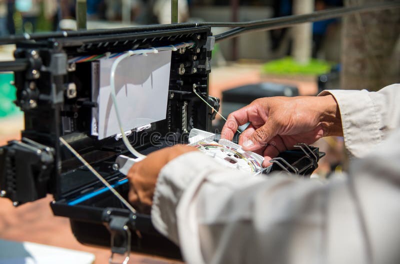 Technicians Install Cabinet on Fiber Optic Cable. Stock Photo - Image ...
