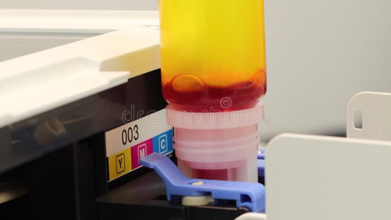 Technicians are Installing Setup the Ink and Insert Ink into the Fill ...