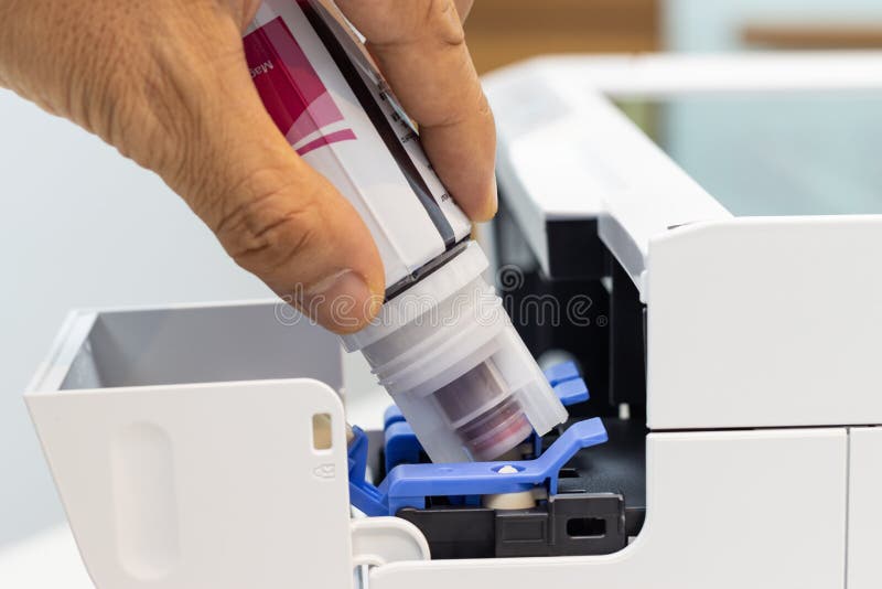 Technicians are Installing Setup the Ink and Insert Ink into the Fill ...