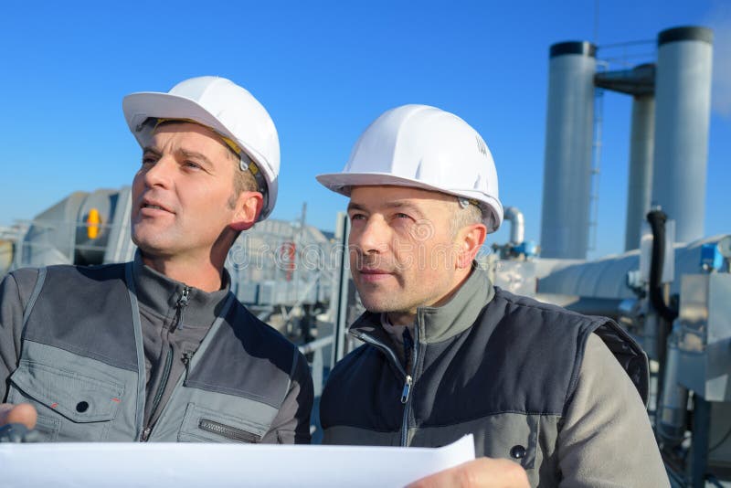 Technicians at Site Working Stock Photo - Image of area, industrial ...