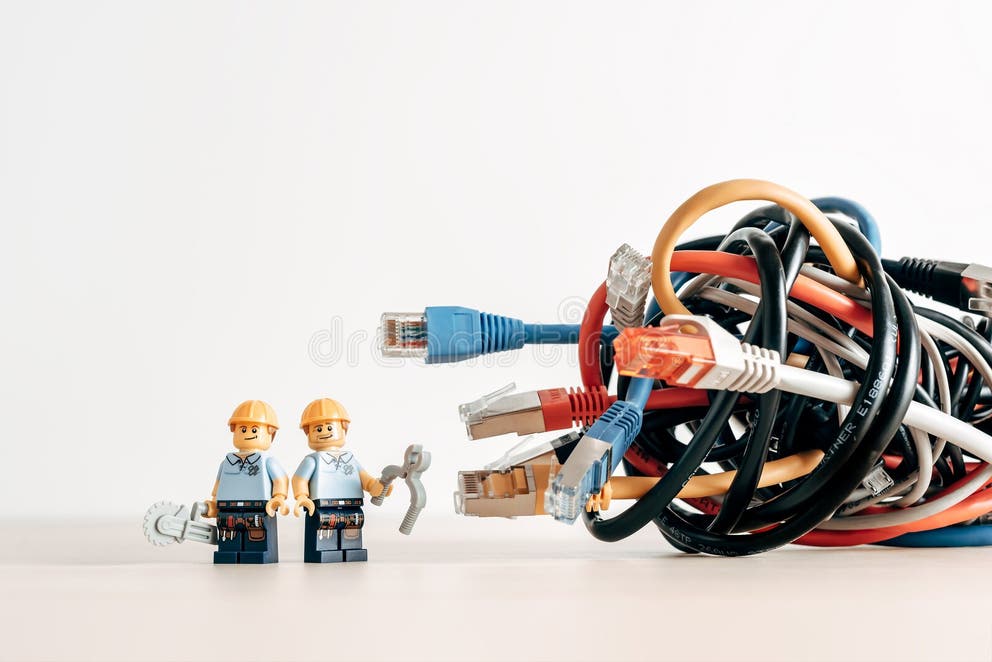 Technicians and a Tangled Bunch of Network Cables. Illustrative ...