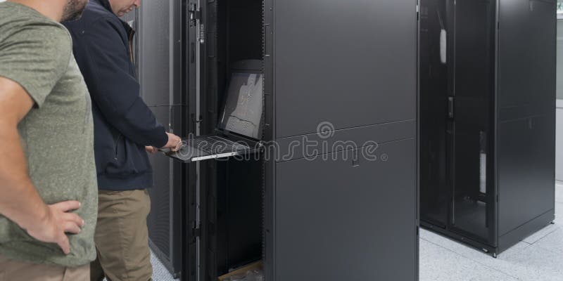 Technicians Team Updating Hardware Inspecting System Performance in ...