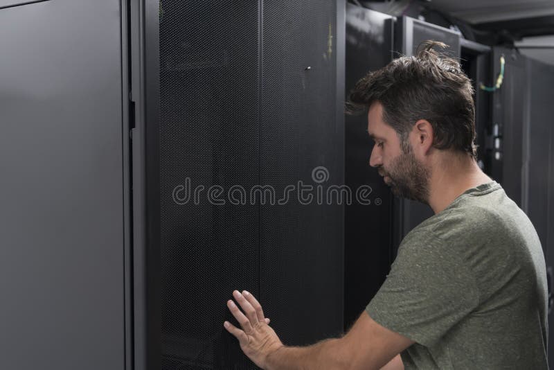 Technicians Team Updating Hardware Inspecting System Performance in ...
