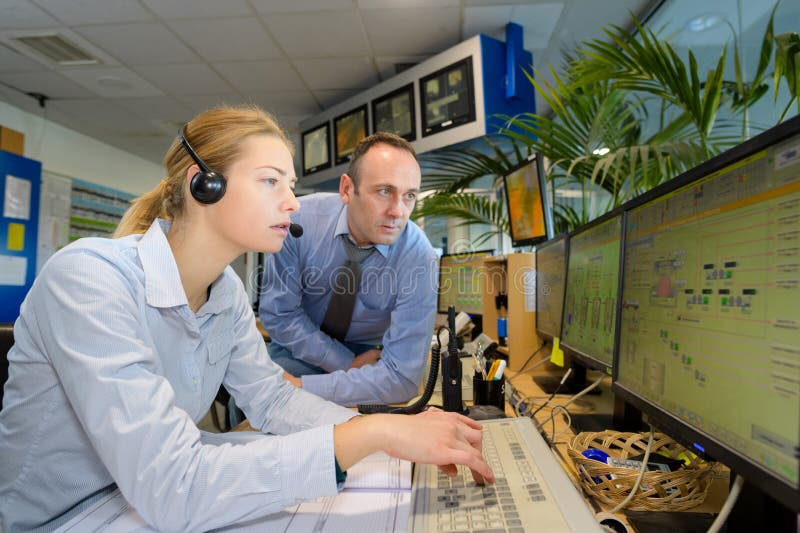 Technicians Using Computer in Server Room Stock Photo - Image of ...