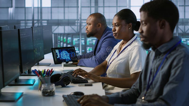 Technicians Using Computers And Tablet In Data Center Implementing Ai
