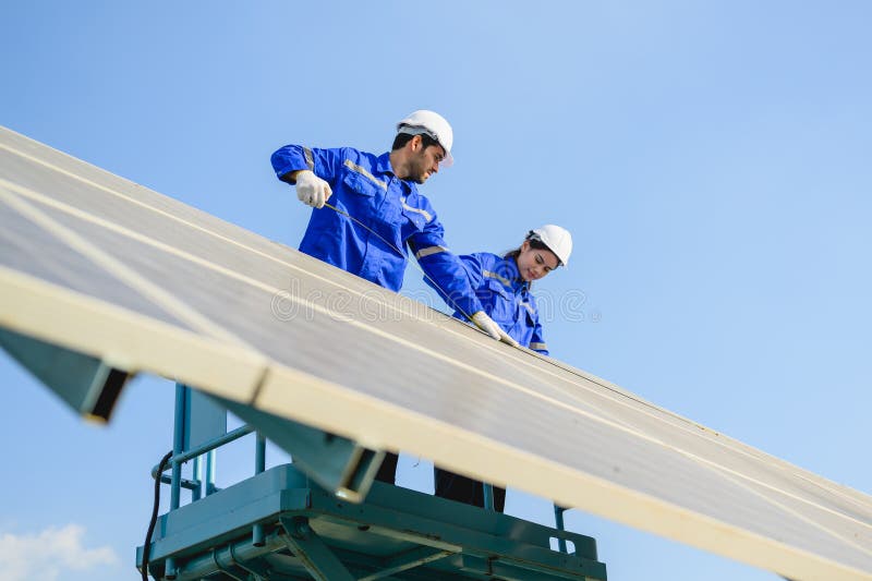 Technicians Workers Installing Solar Panels at Solar Cell Farm Stock ...