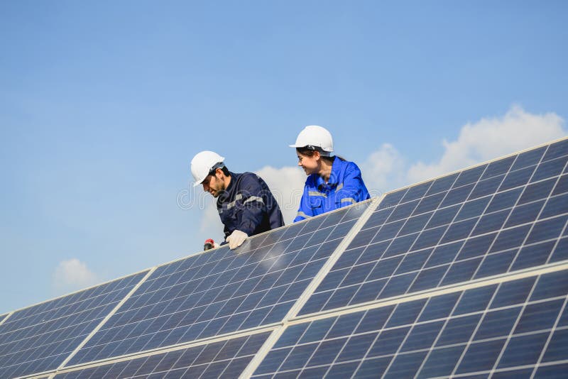 Technicians Workers Installing Solar Panels at Solar Cell Farm Stock ...