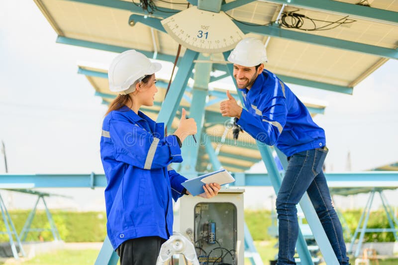 Technicians Workers Installing Solar Panels at Solar Cell Farm Stock Photo - Image of power ...