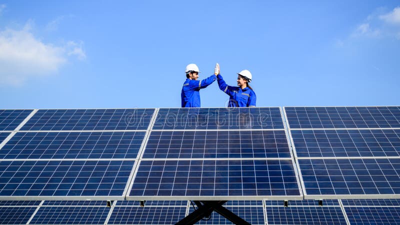 Technicians Workers Installing Solar Panels at Solar Cell Farm Stock ...