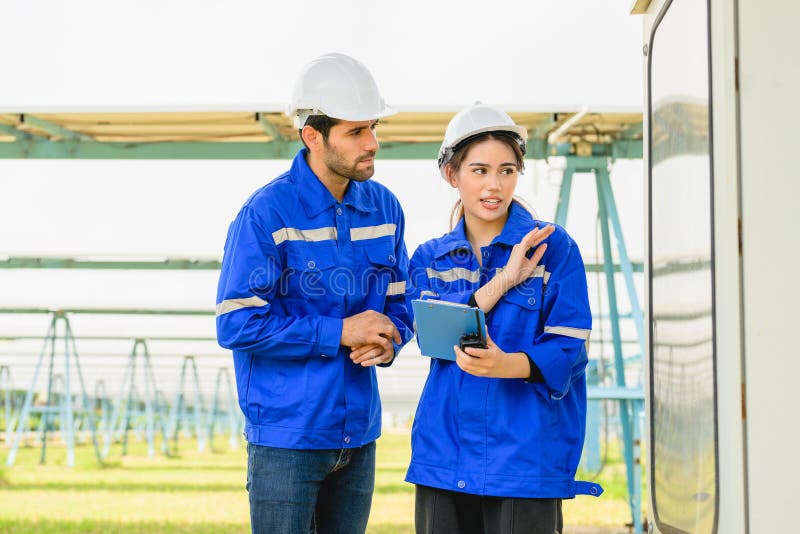 Technicians Workers Installing Solar Panels at Solar Cell Farm Stock ...