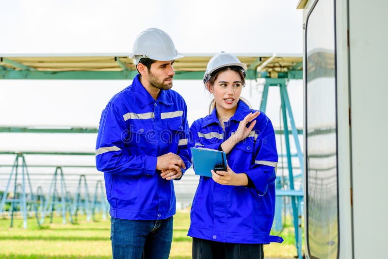 Technicians Workers Installing Solar Panels at Solar Cell Farm Stock ...