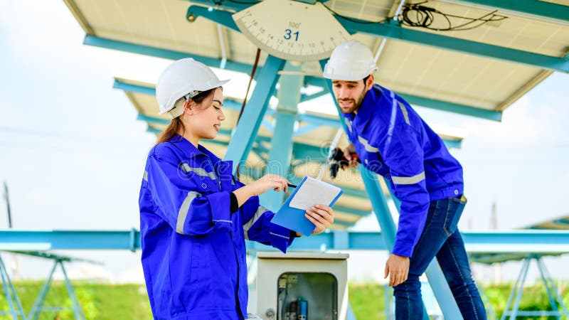 Technicians Workers Installing Solar Panels at Solar Cell Farm Stock ...