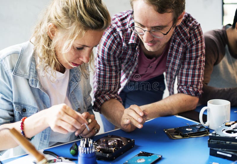 Technicians Working on Computer Hard Disk Stock Photo - Image of ...