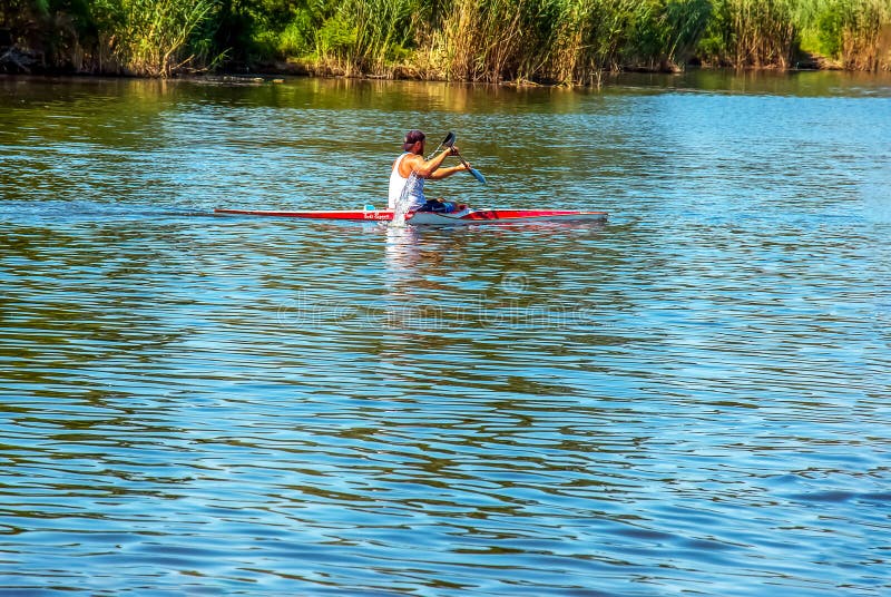 Splash from Rowing Wooden Oar on Boat on a Lake during Sunny Day Stock ...
