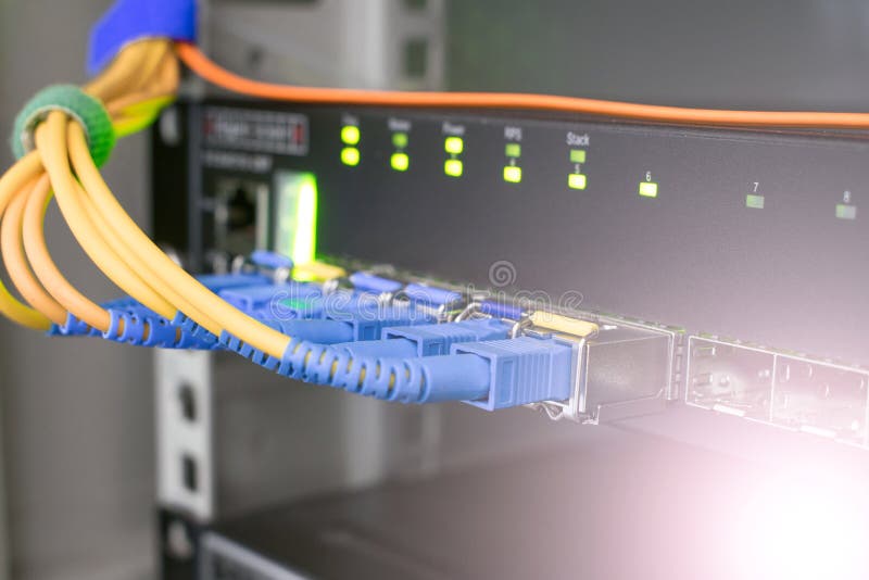 Technological Concept of Data Transfer. Fiber Optic Internet Wires are ...