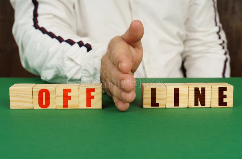 A Man Separates the Cubes with the Inscription - OFF Vs LINE Stock ...