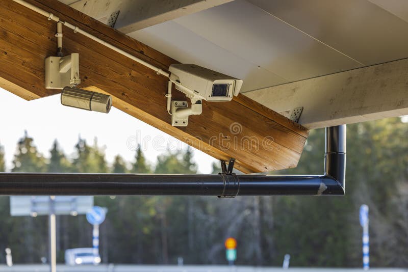 Technological View of Security Surveillance Camera Under Roof of House ...