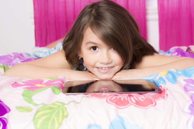 Technologies Become Easier. Cute Little Girl Holding Digital Tablet ...