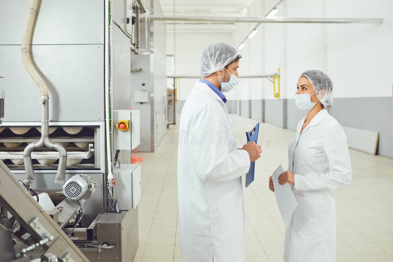 Technologists Inspector in Masks at Food Factory. Stock Image - Image ...