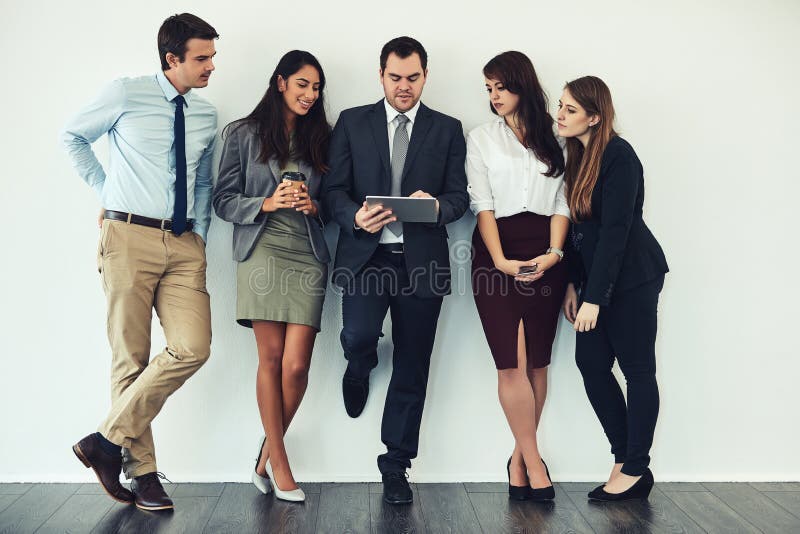 Technology, the Business Connector. Studio Shot of a Group of ...