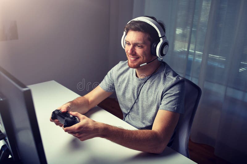 Man in Headset Playing Computer Video Game at Home Stock Image - Image ...