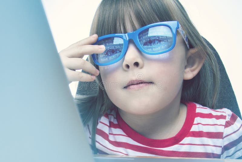 Technology Genius Concept. Little Girl Programming on a Laptop Stock ...