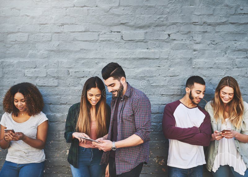 Technology Has the Power To Connect. a Group of Young Friends Using ...