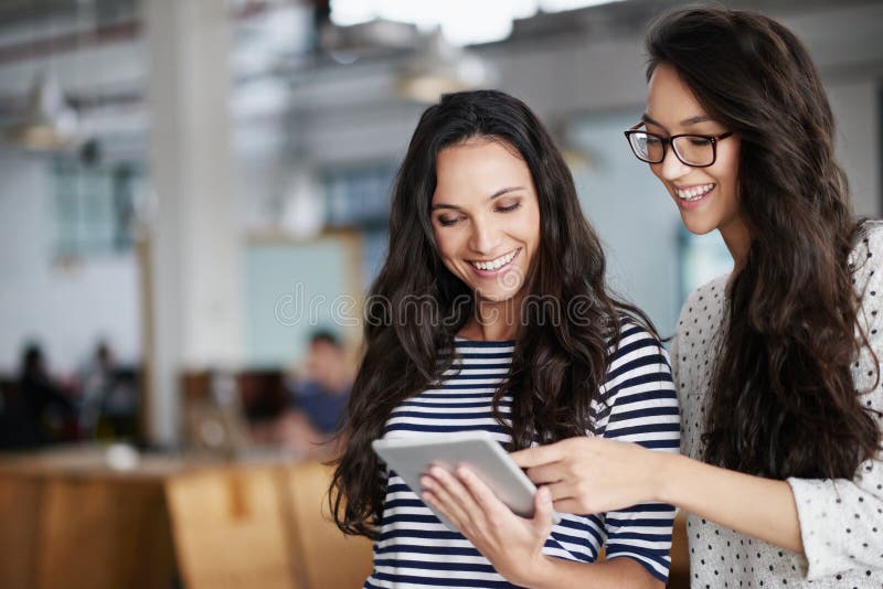 Technology Makes Everything Easier. Two Female Colleagues Posing ...