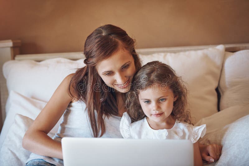 Technology Makes Learning More Interesting and Fun. a Mother and Her ...