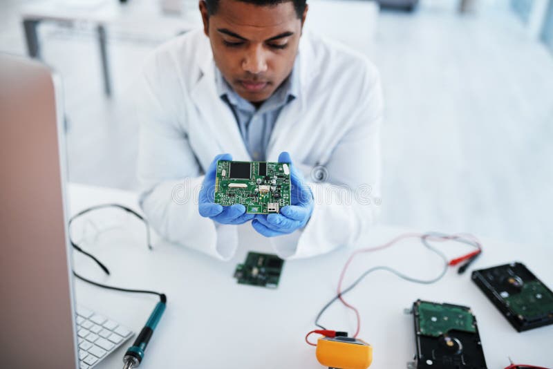 Technology, Motherboard and Man at Desk with Hardware for Maintenance ...