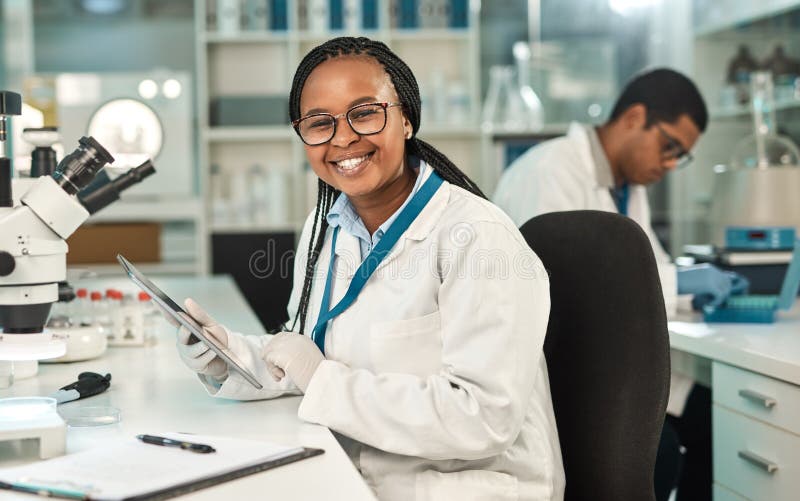 Technology is My Lab Assistant. Portrait of a Young Scientist Using a ...