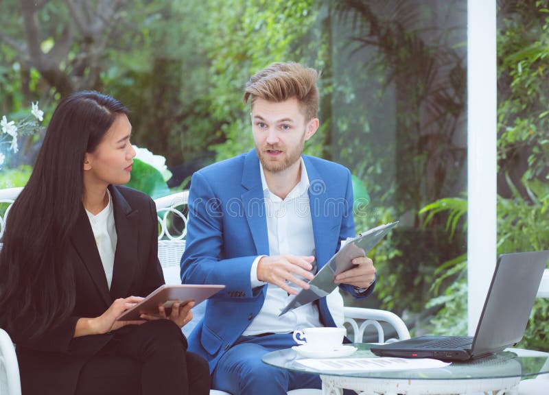 Technology and Office Concept - Two Business Man and Woman with Laptop ...