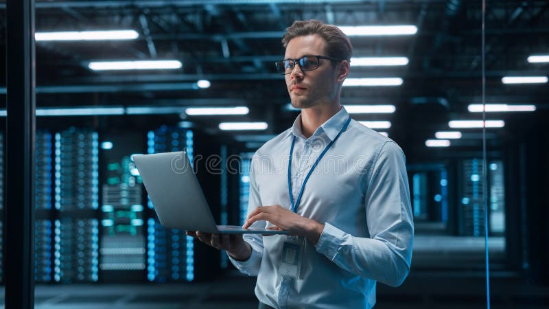 In Technology Research Facility: Chief Engineer Stands in the Middle of ...