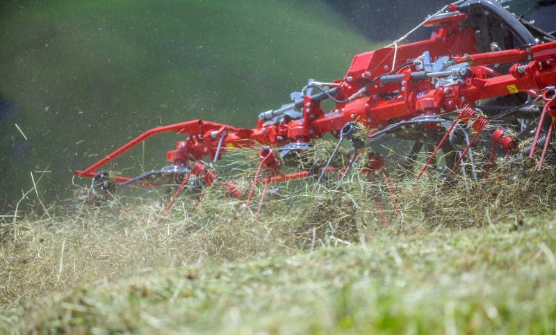 Tedder in an Agricultural Field Stock Image - Image of field, farm ...
