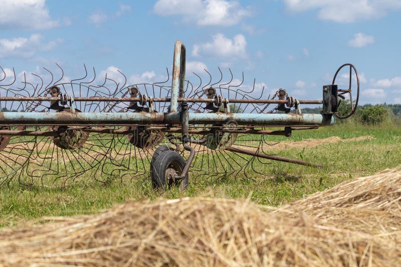 Tedder, Tedder and Hay Rake Stock Photo - Image of agriculture, asphalt ...