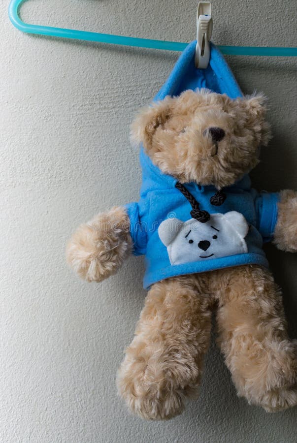 Teddy Bear with Hanger on the Wall. Stock Photo - Image of child ...