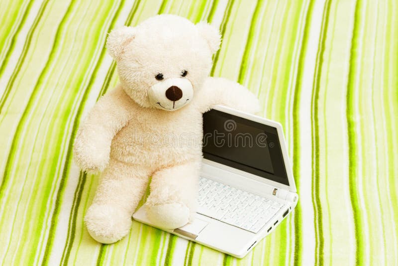 LAPTOP COMPUTER And TEDDY BEAR Stock Photo - Image of silver, laptop ...