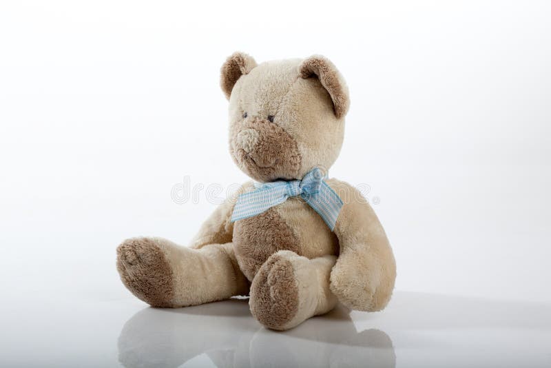 Teddy Bear with a Light Blue Ribbon Stock Image - Image of blue, object ...