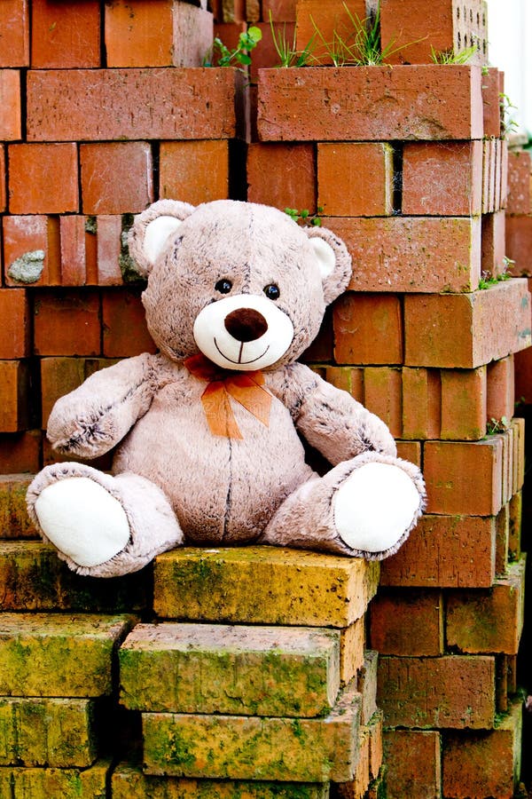 Teddy Bear Sitting on Bricks Stock Photo - Image of stack, brick: 92437082