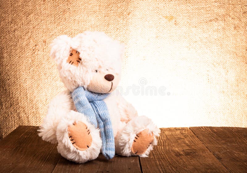 Teddy Bear is Sitting on the Old Wooden Table Stock Photo - Image of ...