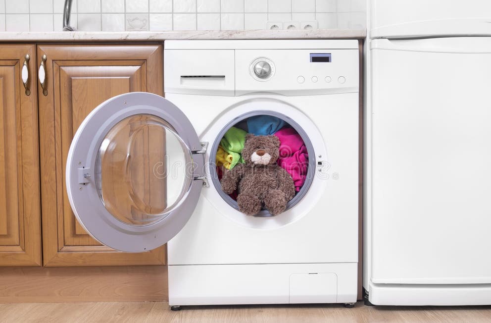 Teddy Bear in a Washing Machine. Stock Photo - Image of caucasian, home ...