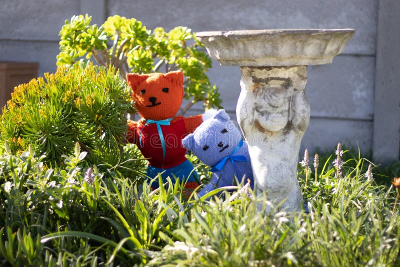 Teddy Bears Hiding Behind Plants in a Garden Stock Image - Image of ...