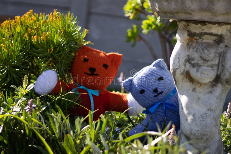 Teddy Bears Hiding Behind Plants in a Garden Stock Image - Image of ...