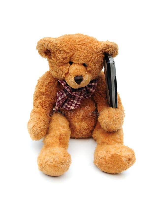 Teddy on a mobile phone stock photo. Image of mobile, adorable - 7001012