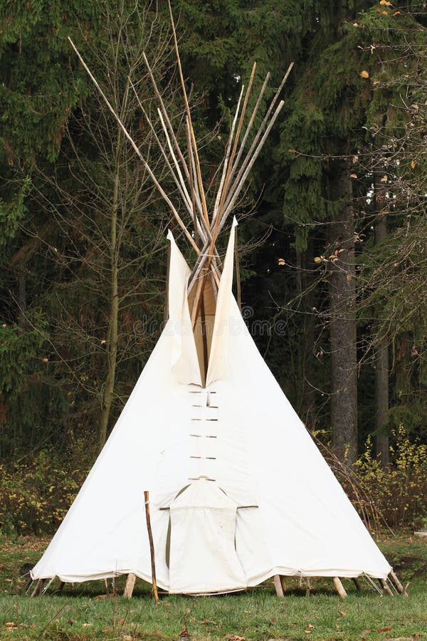Tee-pee stock image. Image of grass, white, trees, wood - 35787227