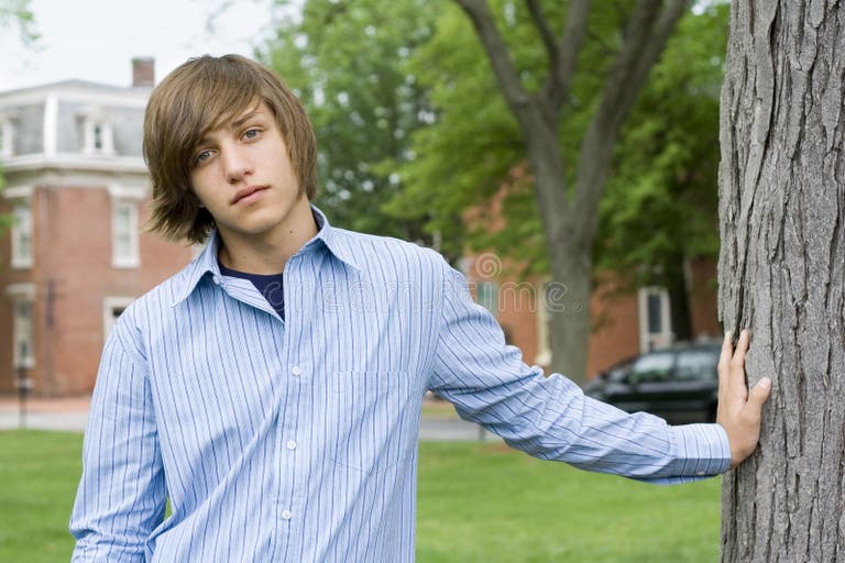 Teen Boy Next To Tree Stock Photos - Free & Royalty-Free Stock Photos ...