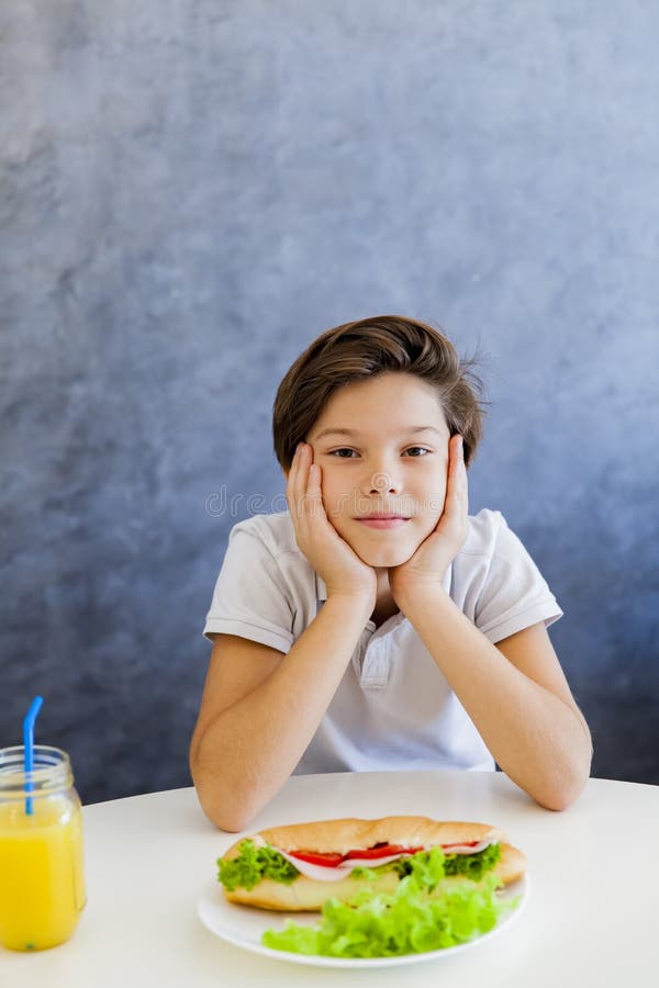 Teen Boy Having Breakfast at Home Stock Image - Image of table ...