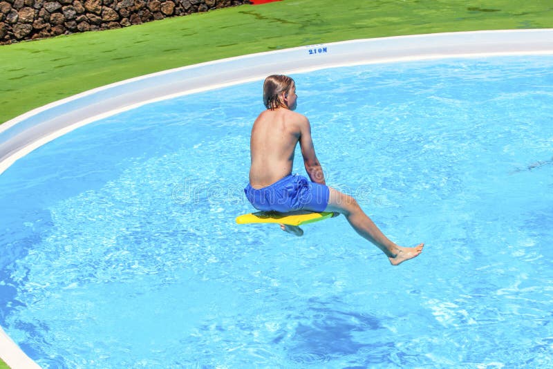 Teen Boy Jumping in the Blue Pool Stock Image - Image of happiness ...
